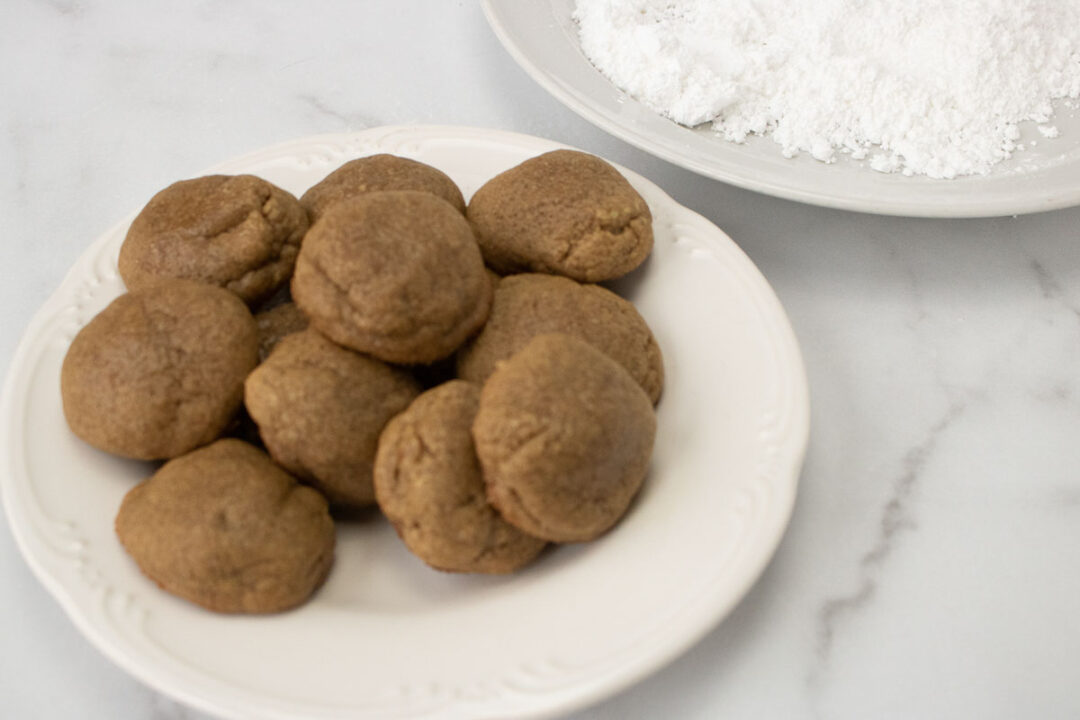 Pfeffernusse German Spice Cookies with Powdered Sugar